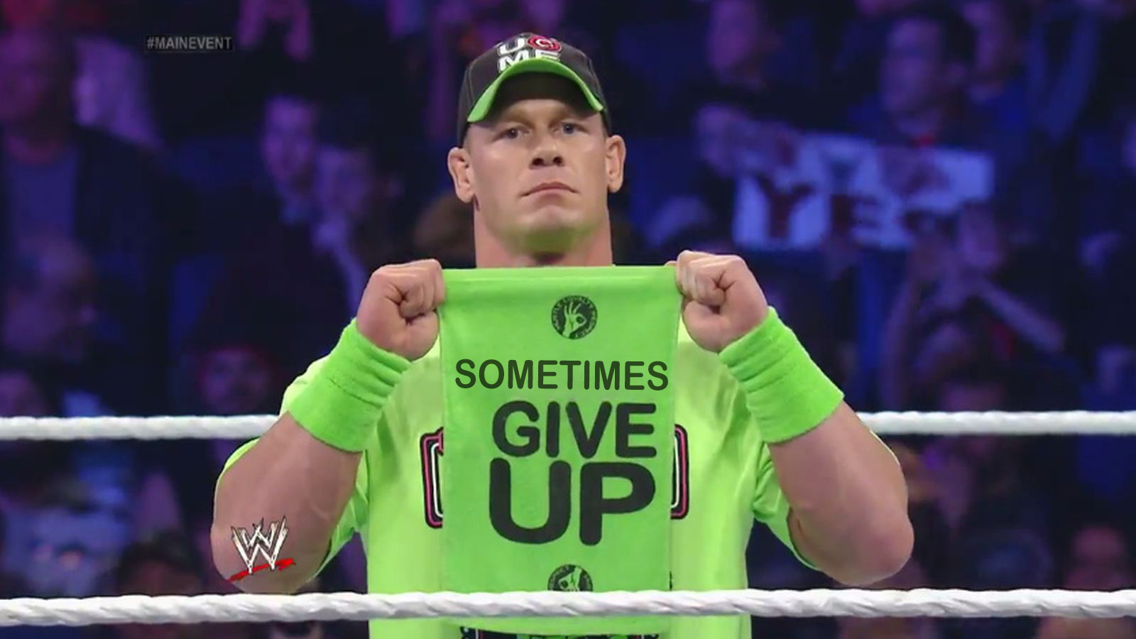 Cena changes slogan to more realistic "Sometimes Give Up"